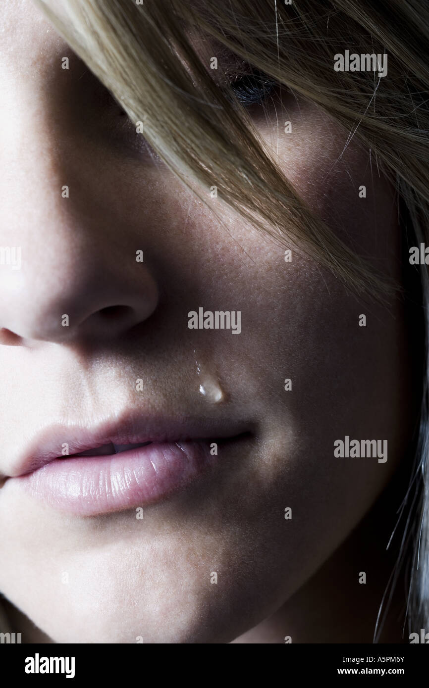 Close up of a woman crying Stock Photo - Alamy