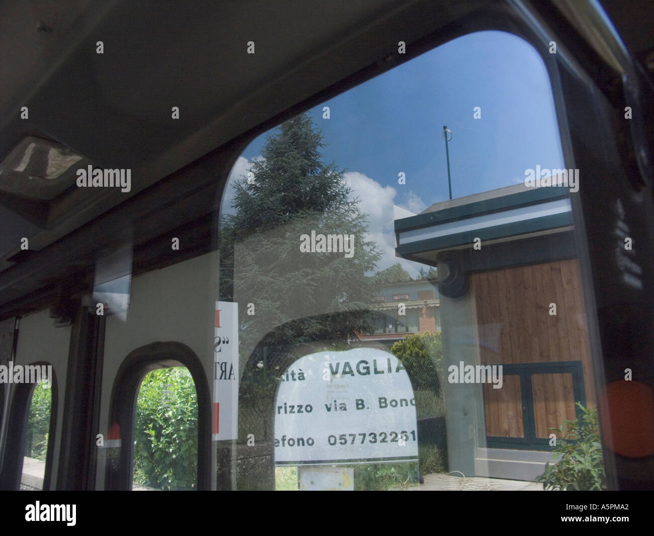 City buildings reflected in bus windows Stock Photo - Alamy