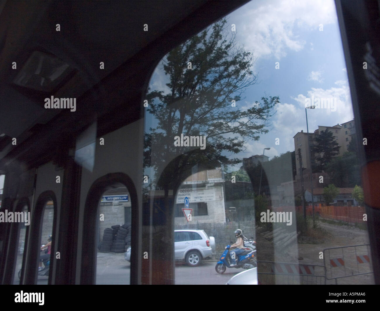 City buildings reflected in bus windows Stock Photo - Alamy