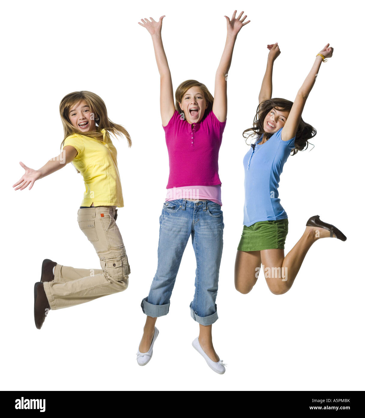Three girls jumping Stock Photo - Alamy