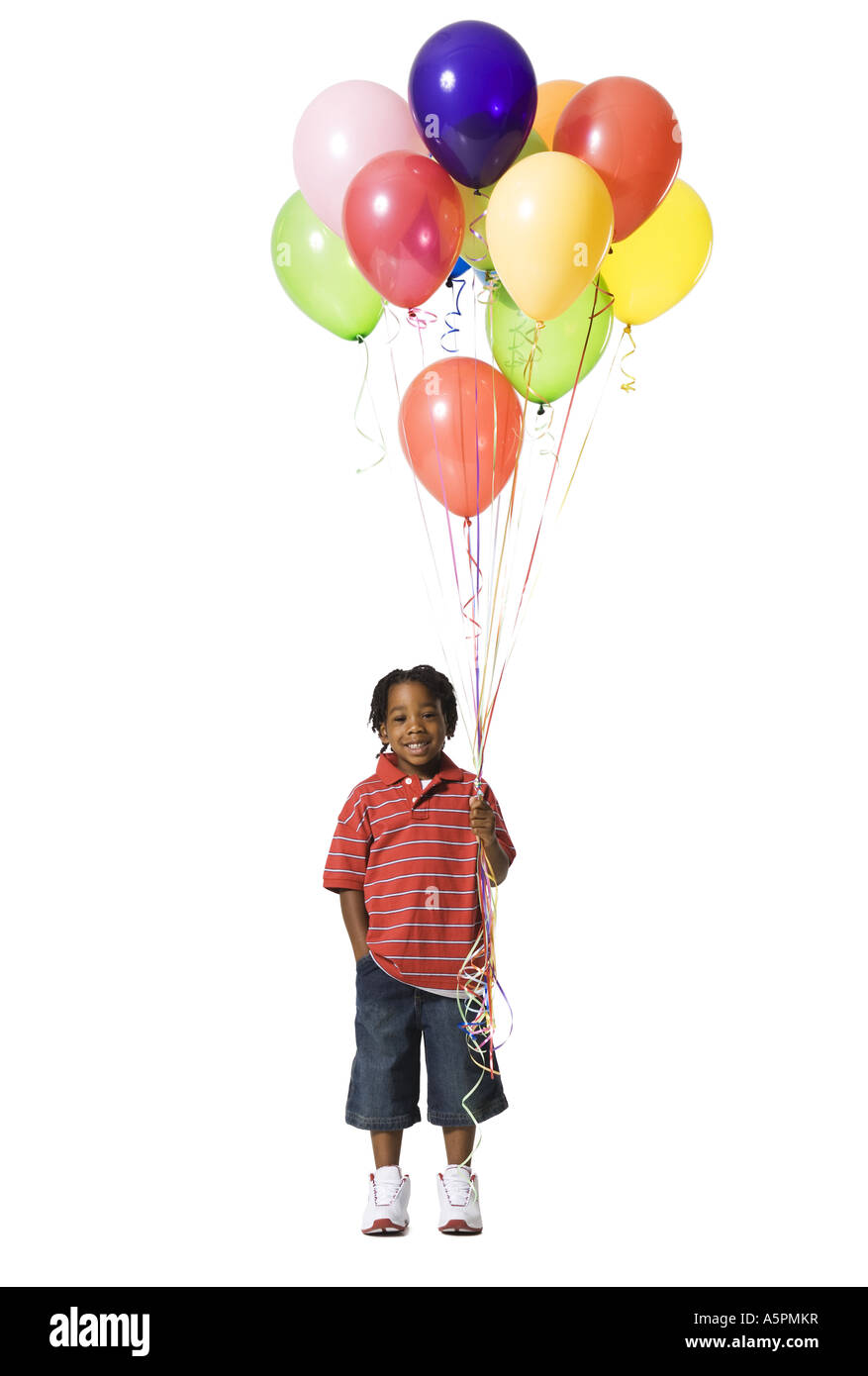 Young boy with balloons Stock Photo - Alamy
