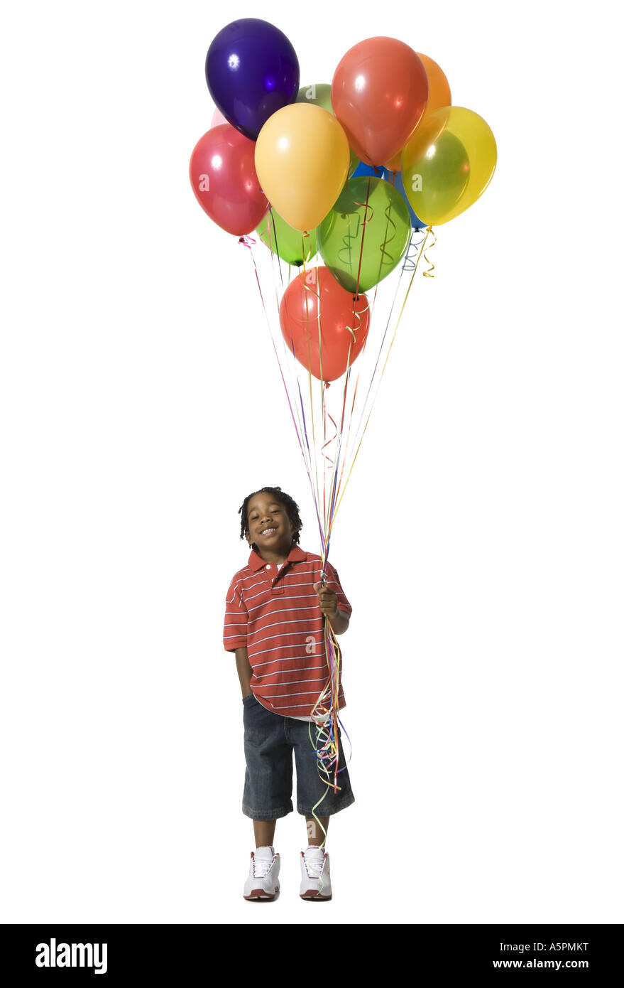 Young boy with balloons Stock Photo - Alamy