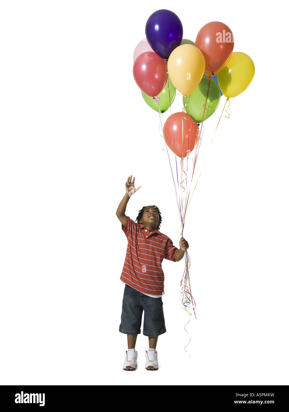 Young boy with balloons Stock Photo - Alamy