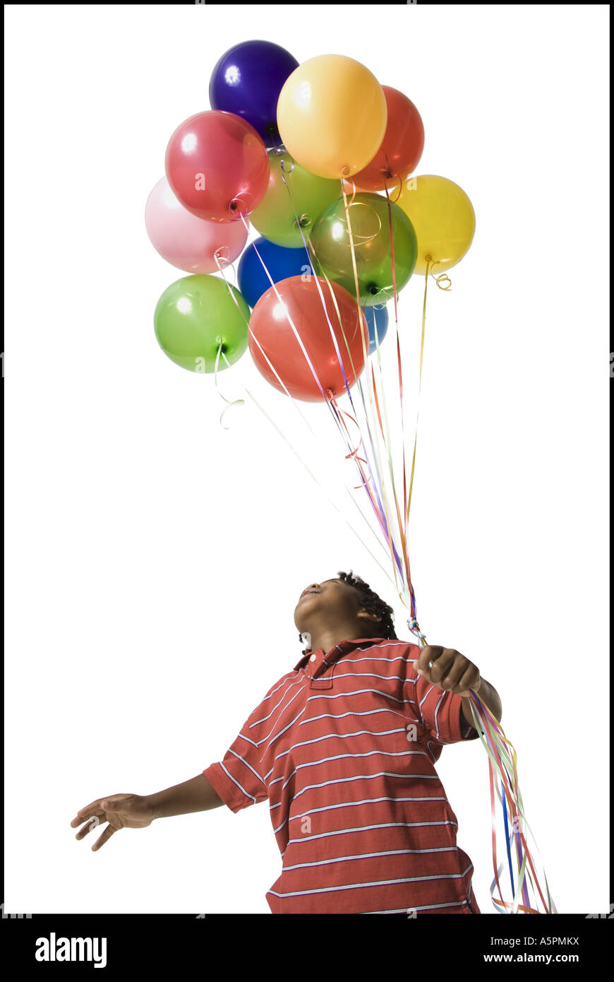Young boy with balloons Stock Photo - Alamy