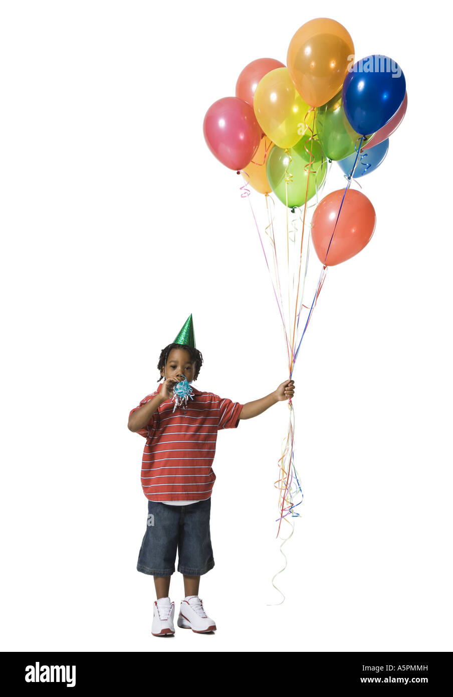Young boy with balloons Stock Photo - Alamy