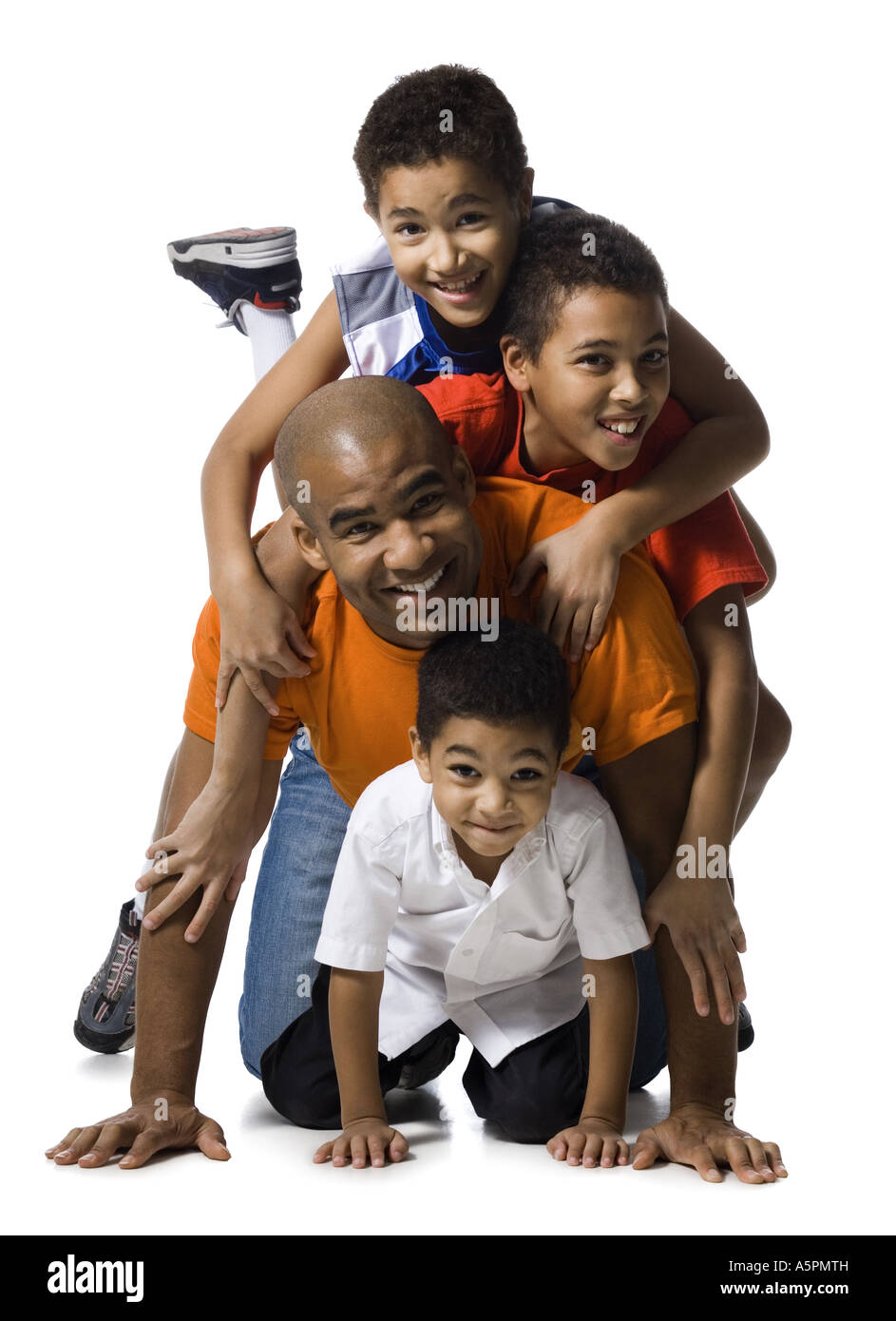Father posing with three sons Stock Photo - Alamy