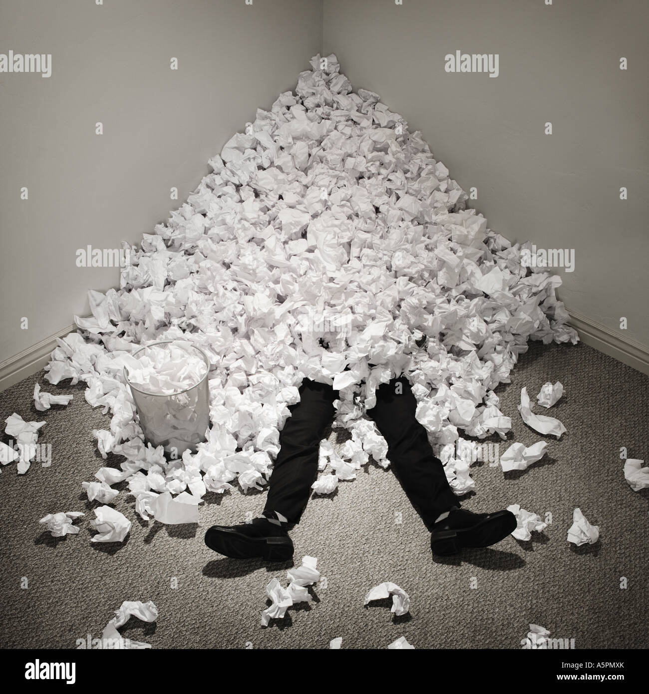 Businessman buried in mountain of crumpled papers Stock Photo - Alamy Businessman buried in mountain of crumpled papers Stock Photo - Alamy