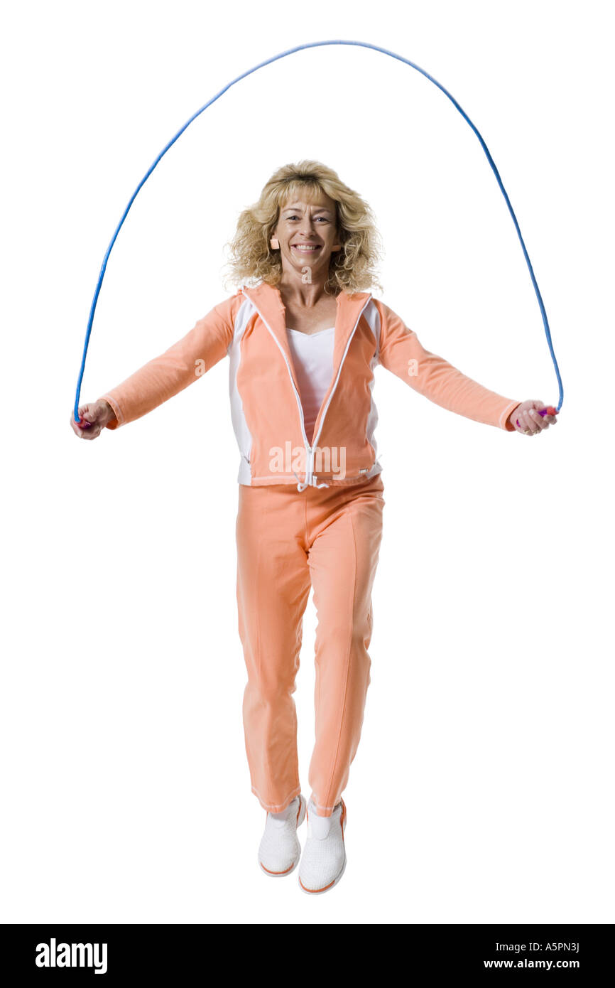 Mature woman skipping rope Cut Out Stock Images & Pictures - Alamy
