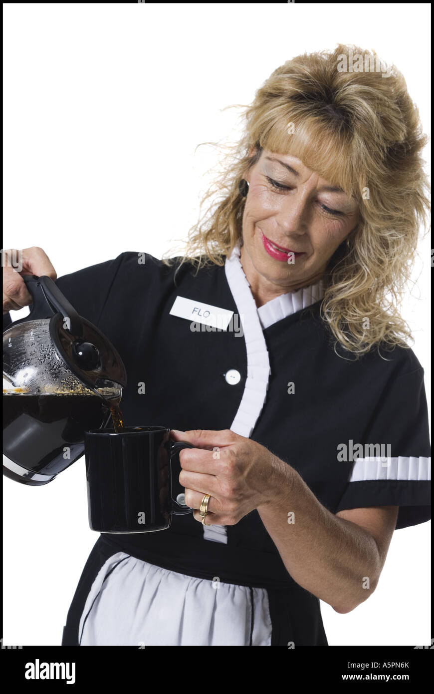 Waitress serving coffee Stock Photo - Alamy