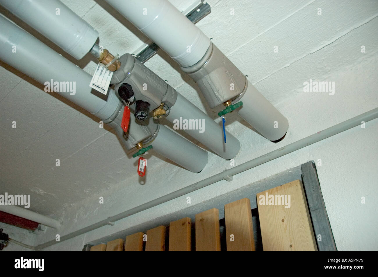 piping in the basement Stock Photo - Alamy
