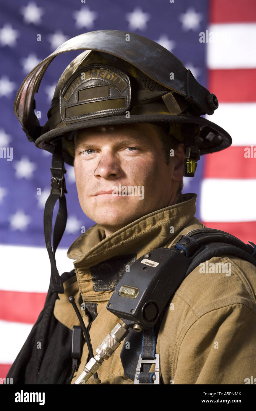 Portrait of a firefighter with US flag Stock Photo - Alamy