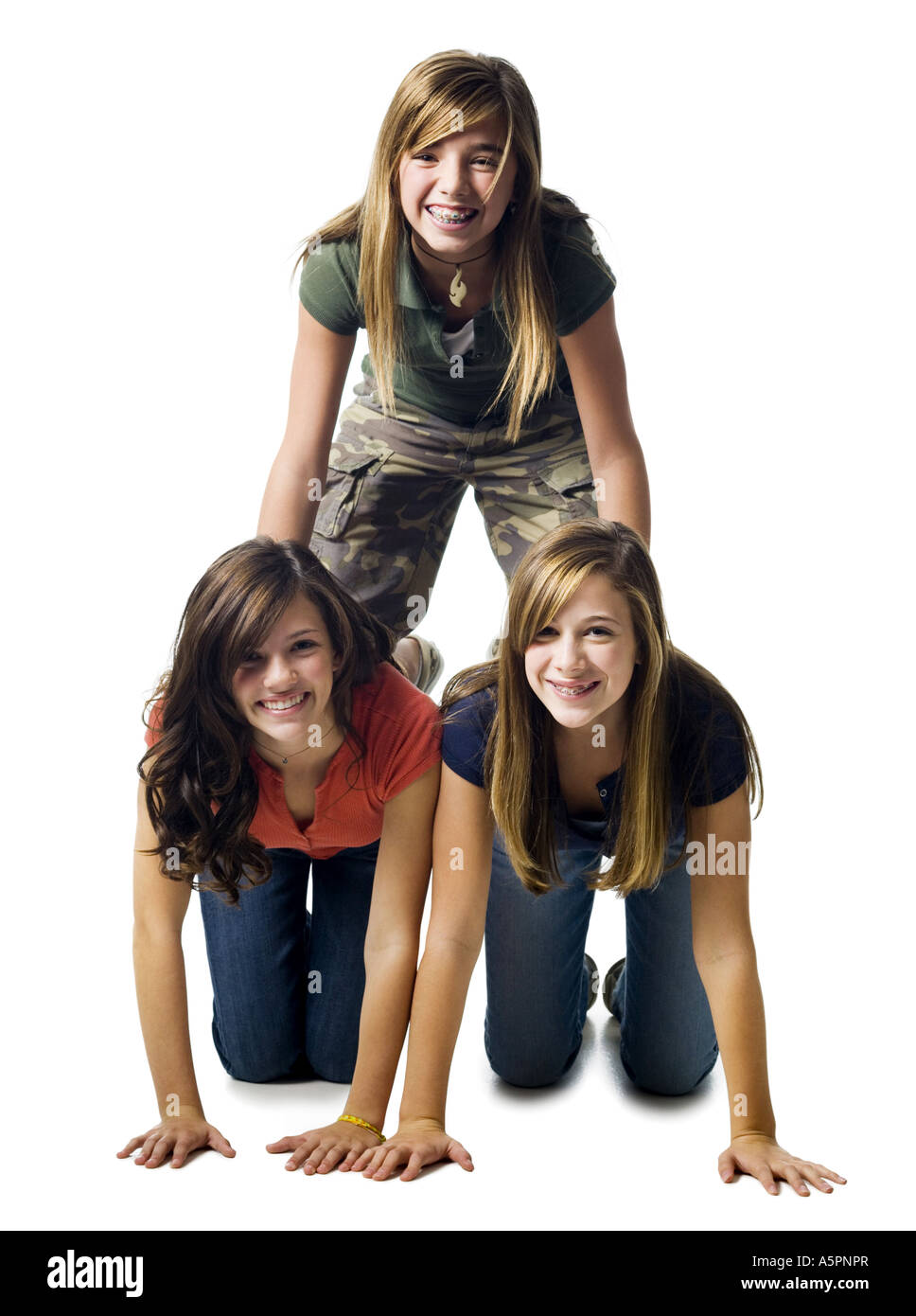 Three girls smiling Stock Photo - Alamy