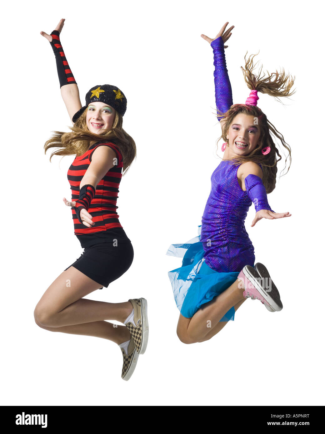 Girls leaping with costumes Stock Photo - Alamy