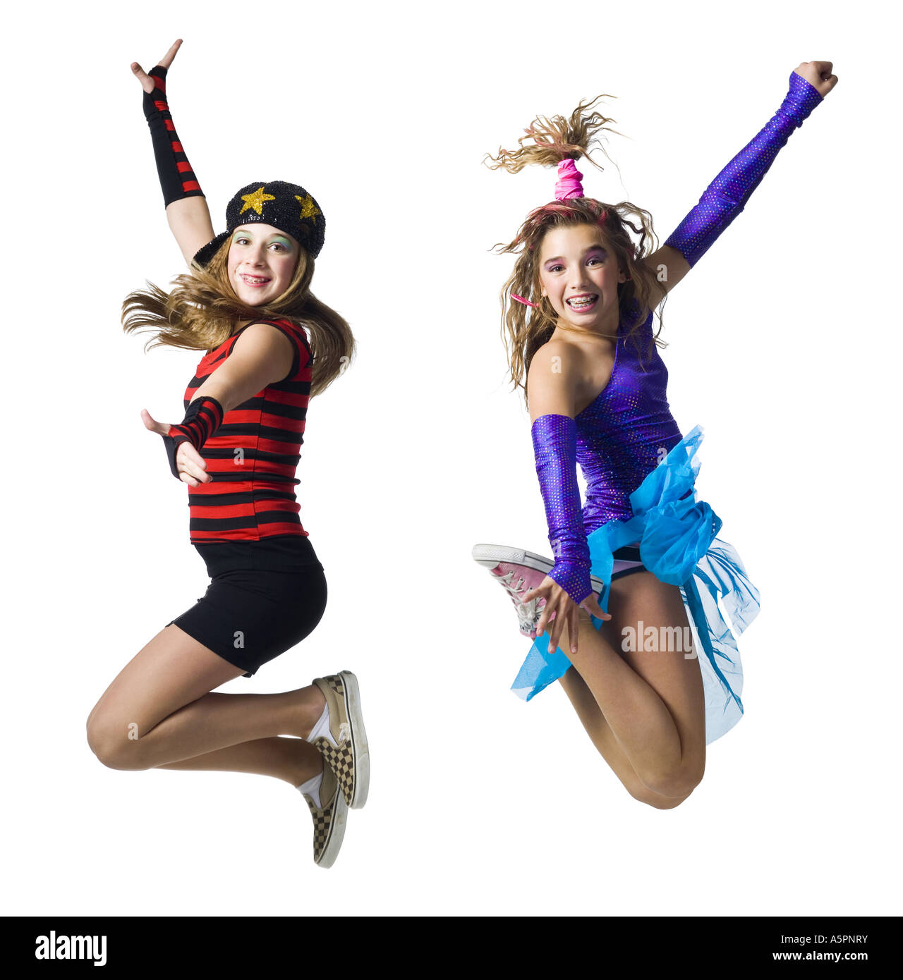 Girls leaping with costumes Stock Photo - Alamy