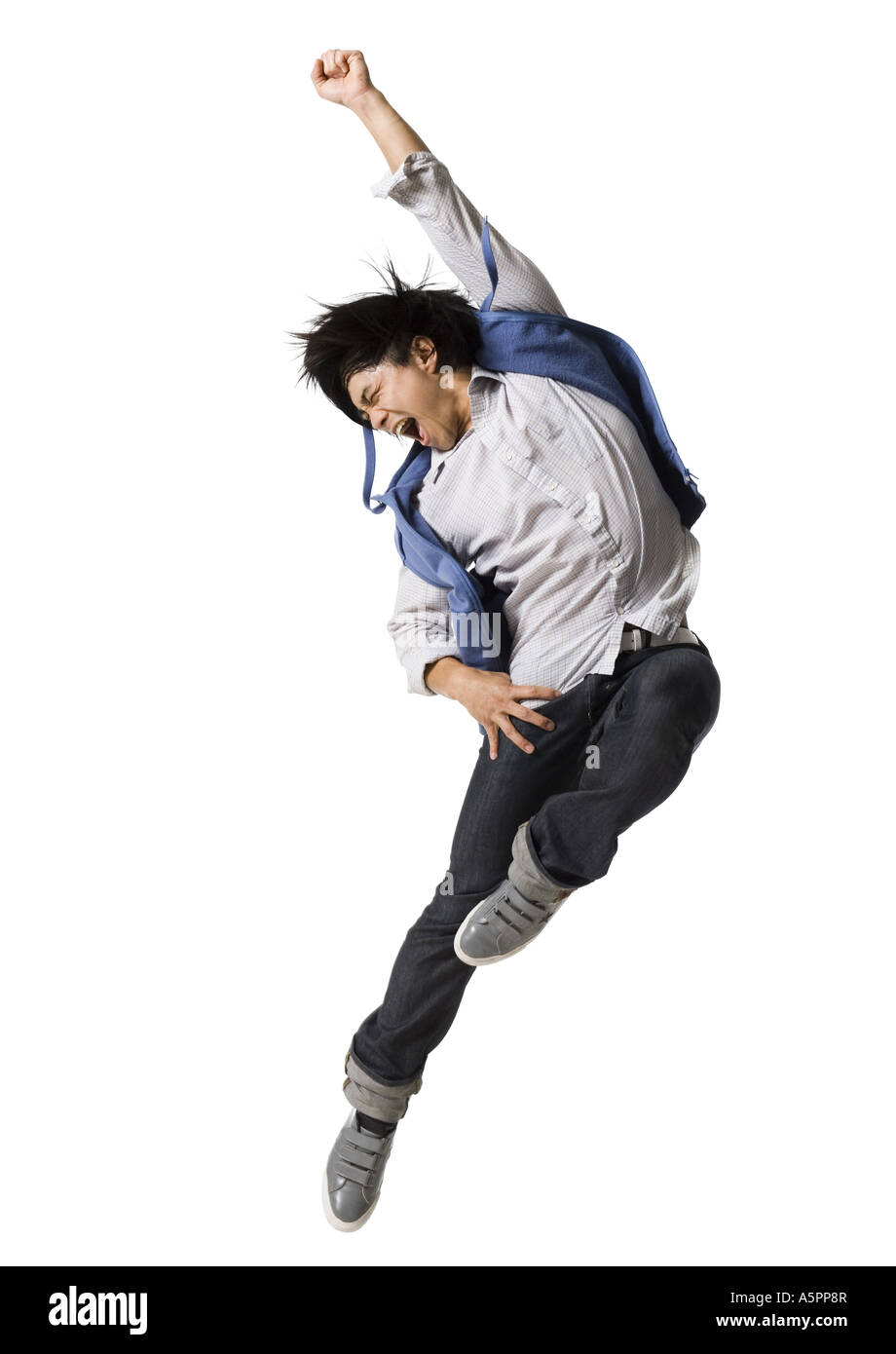 Man leaping with arm up Stock Photo - Alamy