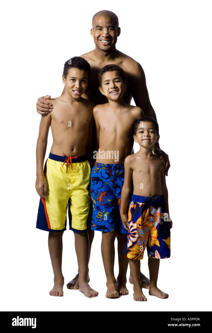 Father posing with three sons Stock Photo - Alamy