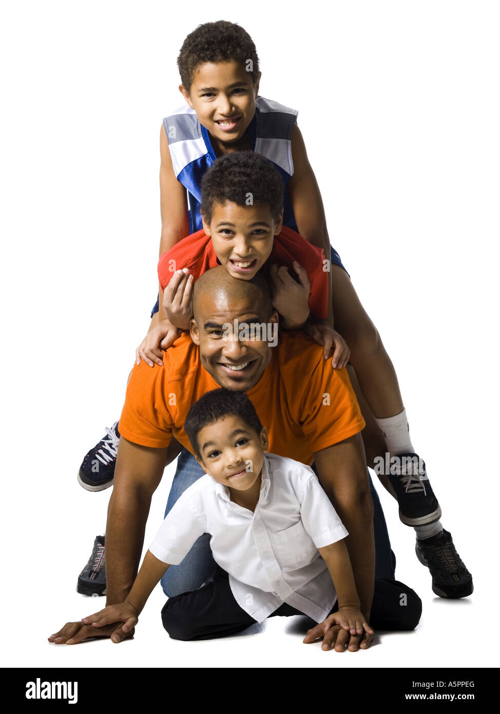 Father posing with three sons Stock Photo - Alamy
