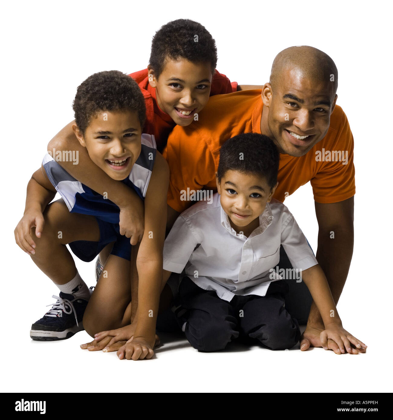 Father posing with three sons Stock Photo - Alamy