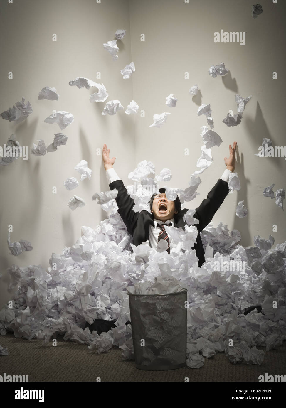 Businessman buried in mountain of crumpled papers Stock Photo - Alamy Businessman buried in mountain of crumpled papers Stock Photo - Alamy