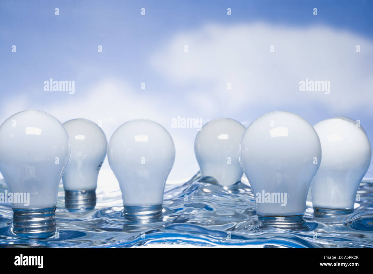 Light bulbs floating in water Stock Photo - Alamy