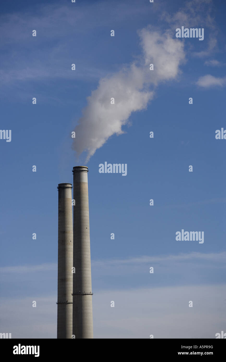 Smoke coming out of smoke stacks Stock Photo - Alamy