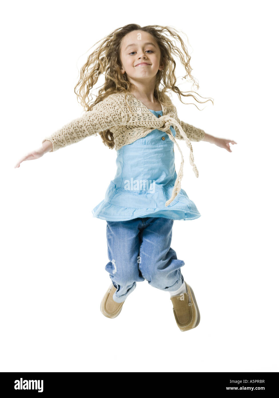 Portrait of a girl jumping in mid air Stock Photo - Alamy