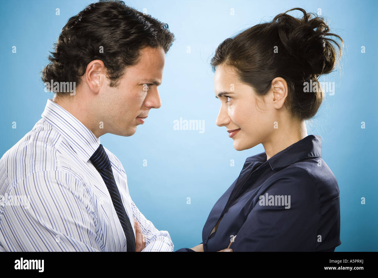 Men looking to each other profile hi-res stock photography and images ...