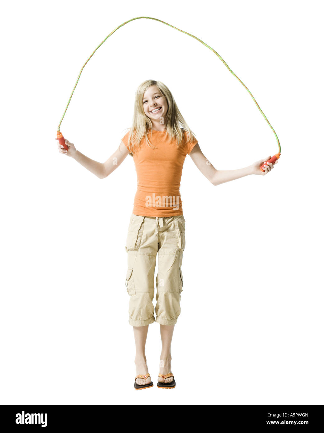 Portrait of a girl jumping rope Stock Photo - Alamy