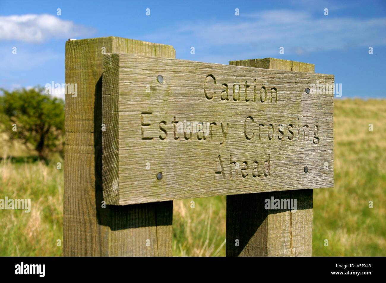 Caution Estuary Crossing Ahead warning sign at Alnmouth Northumberland ...