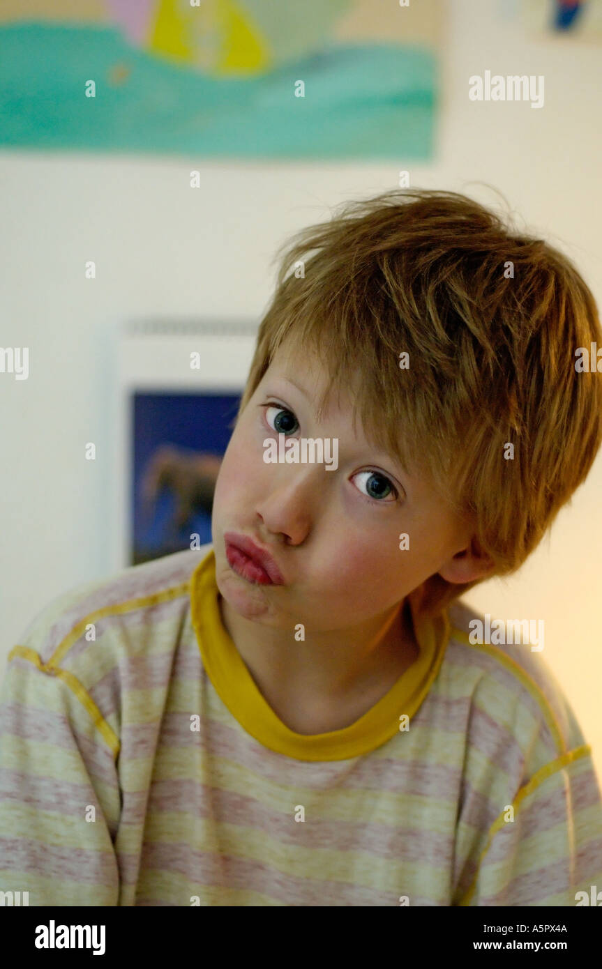 Child puckering lips hi-res stock photography and images - Alamy