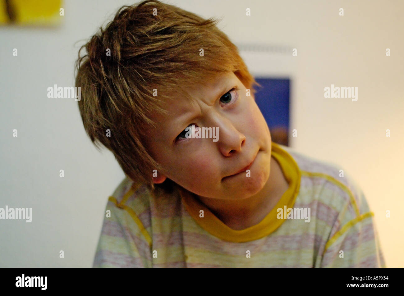 boy looking tense Stock Photo - Alamy