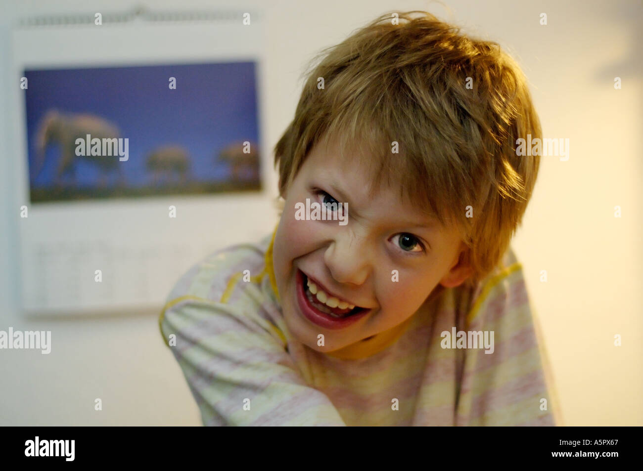 boy being cheeky Stock Photo - Alamy