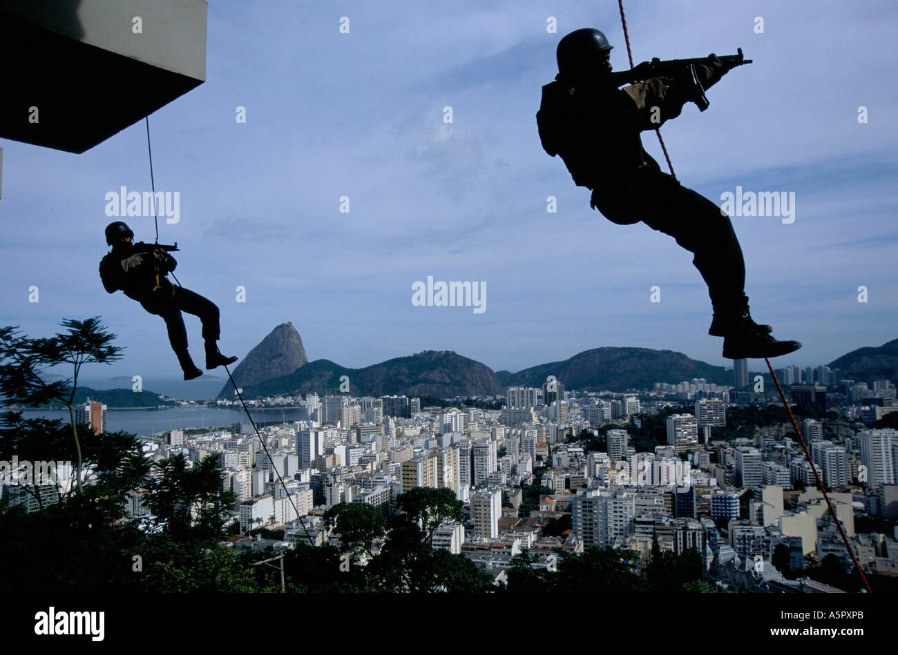The BOPE police force practice abseiling during training with backdrop ...