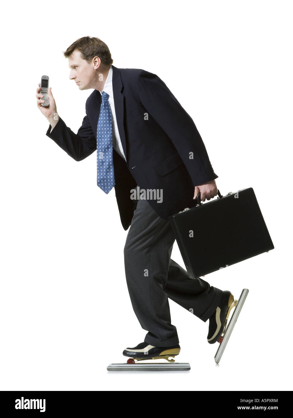 Profile of a businessman ice skating Stock Photo - Alamy