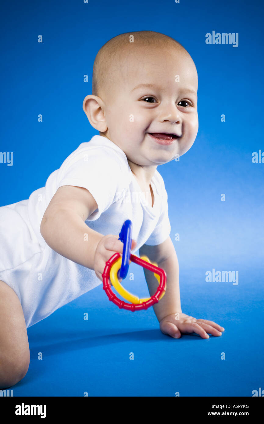 Baby with teething ring Stock Photo - Alamy