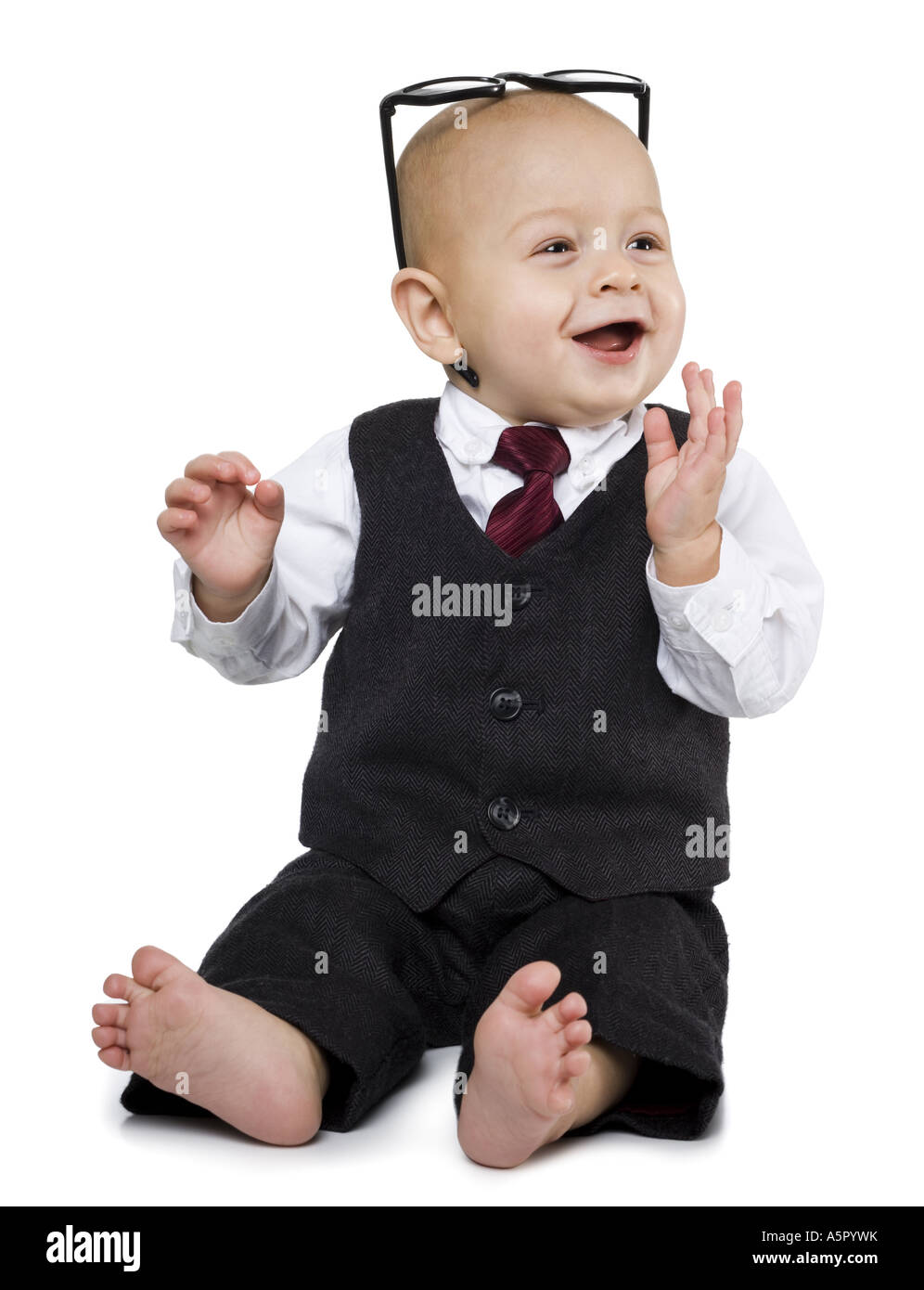 Baby boy in business suit sitting Stock Photo - Alamy