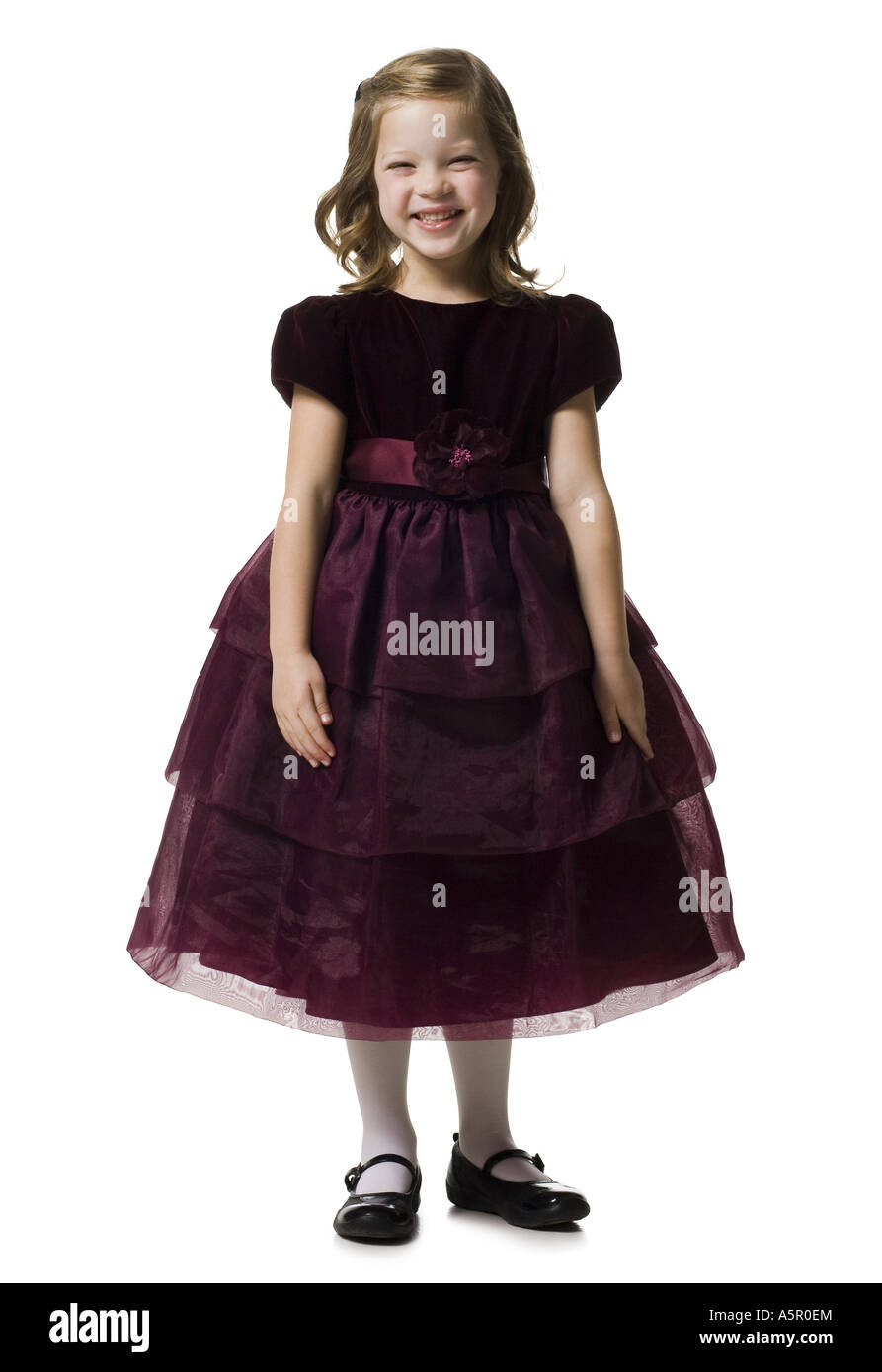 Formally dressed girl smiling Stock Photo - Alamy