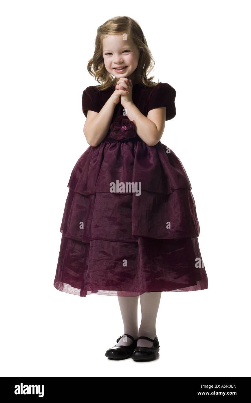 Formally dressed girl smiling Stock Photo - Alamy