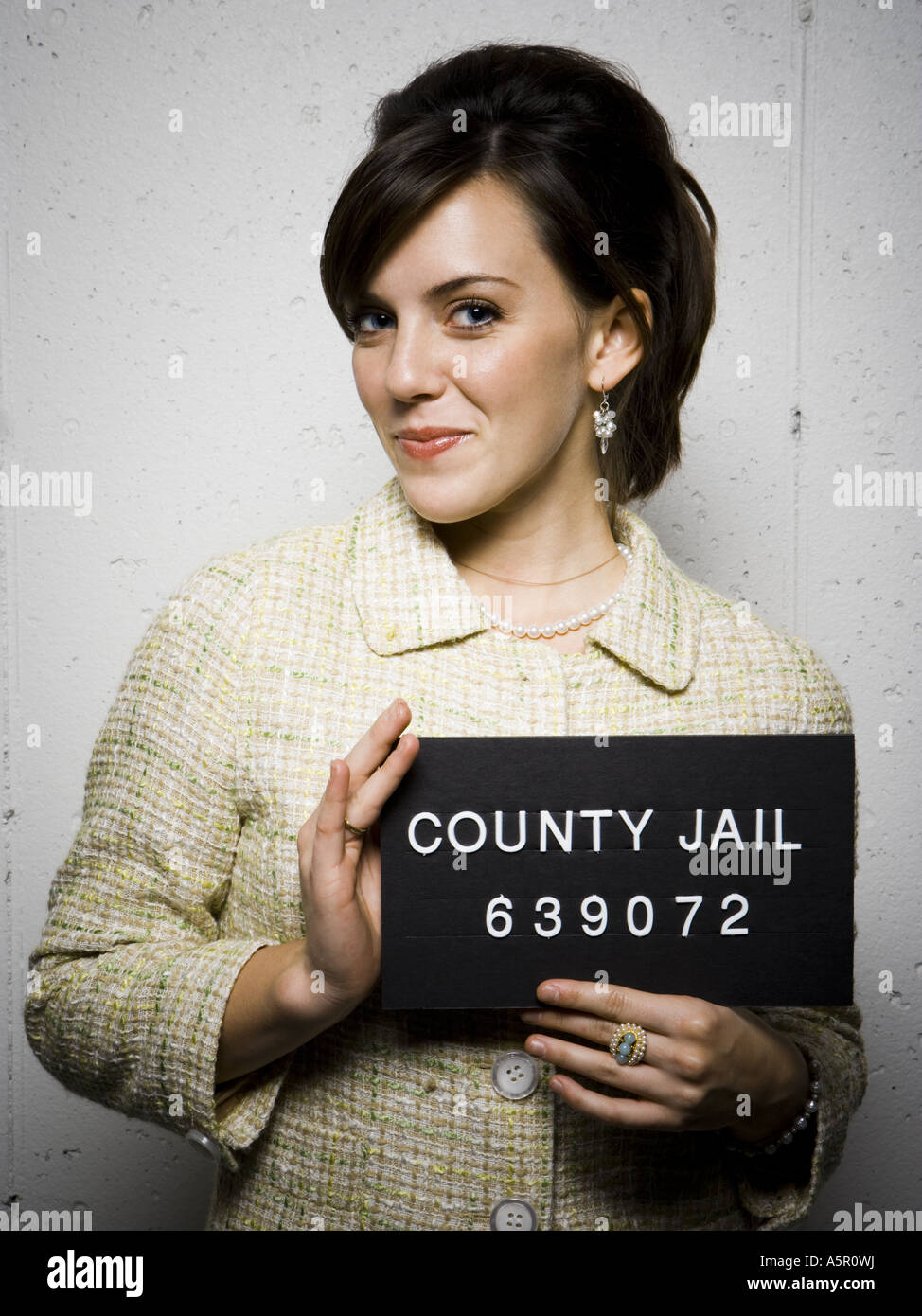 Mug shot of formally dressed woman Stock Photo - Alamy