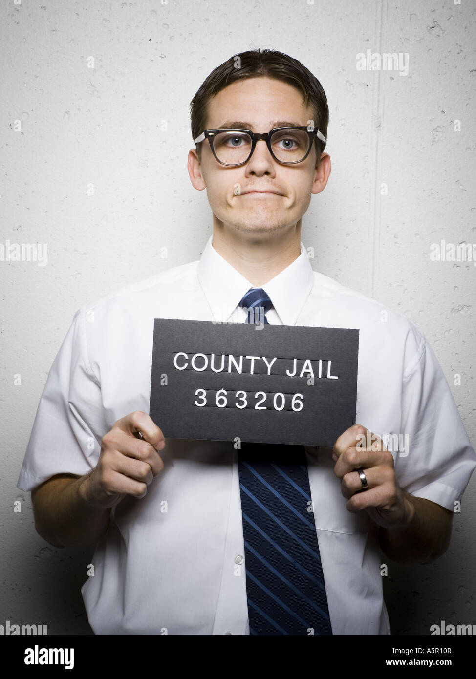 Mug shot of nerd with glasses Stock Photo - Alamy