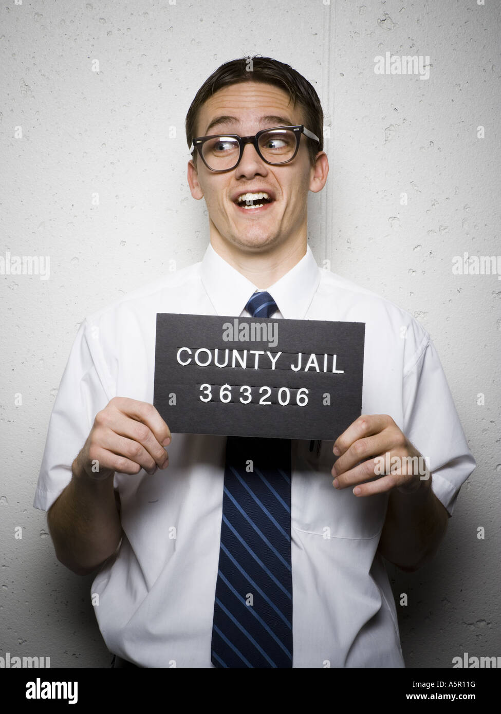 Mug shot of nerd with glasses Stock Photo - Alamy