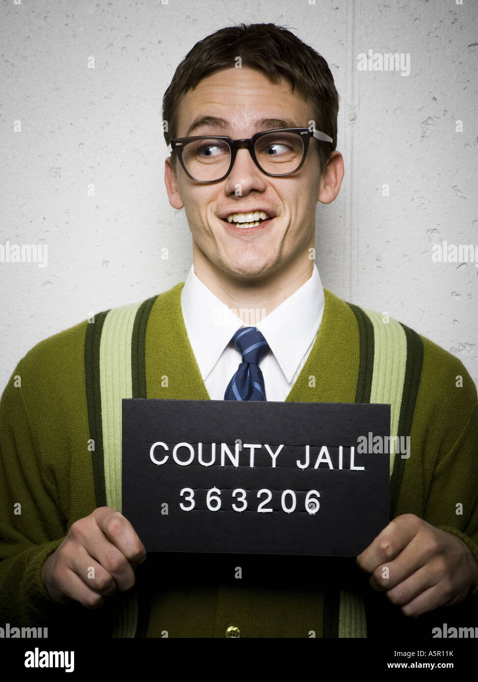 Mug shot of nerd with glasses Stock Photo - Alamy