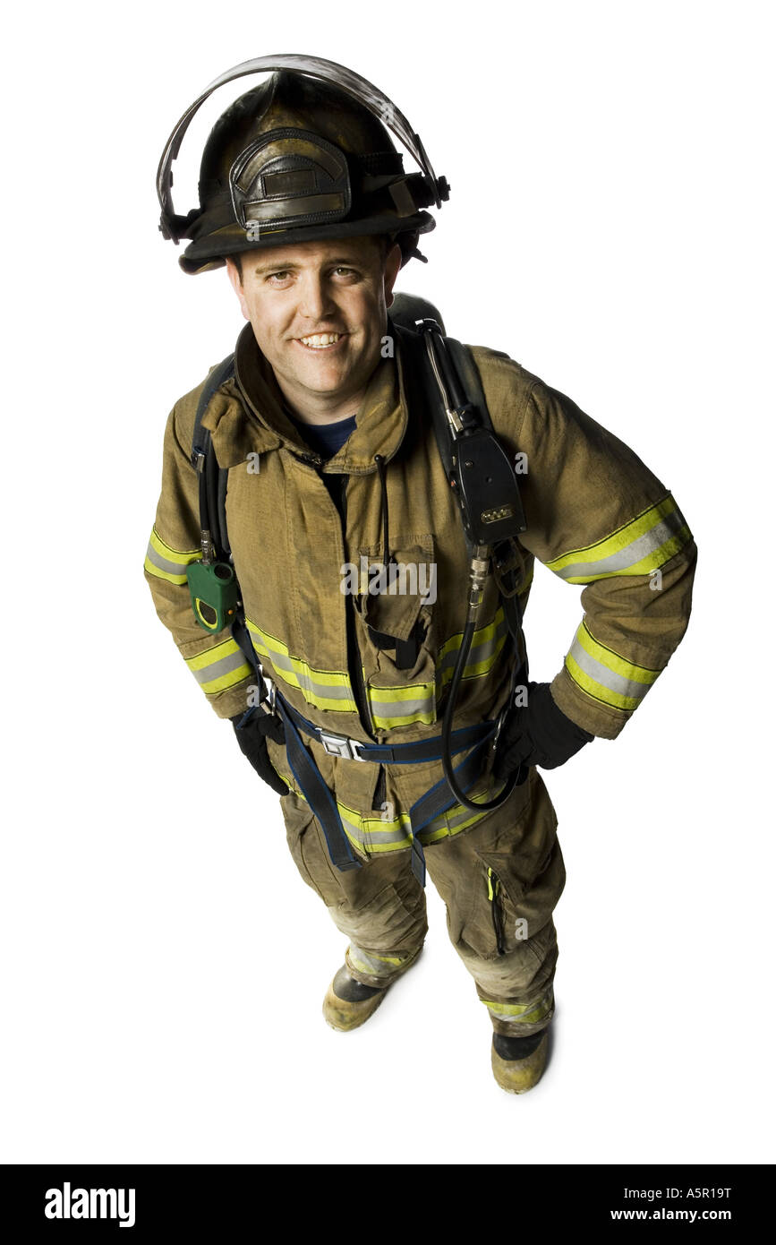 Portrait of a firefighter smiling Stock Photo - Alamy
