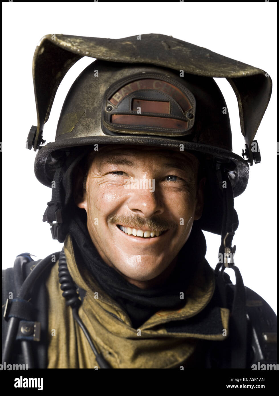 Portrait of a firefighter smiling Stock Photo - Alamy