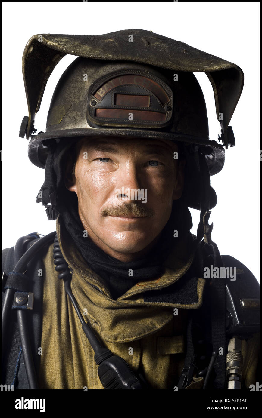 Portrait of a firefighter smiling Stock Photo - Alamy