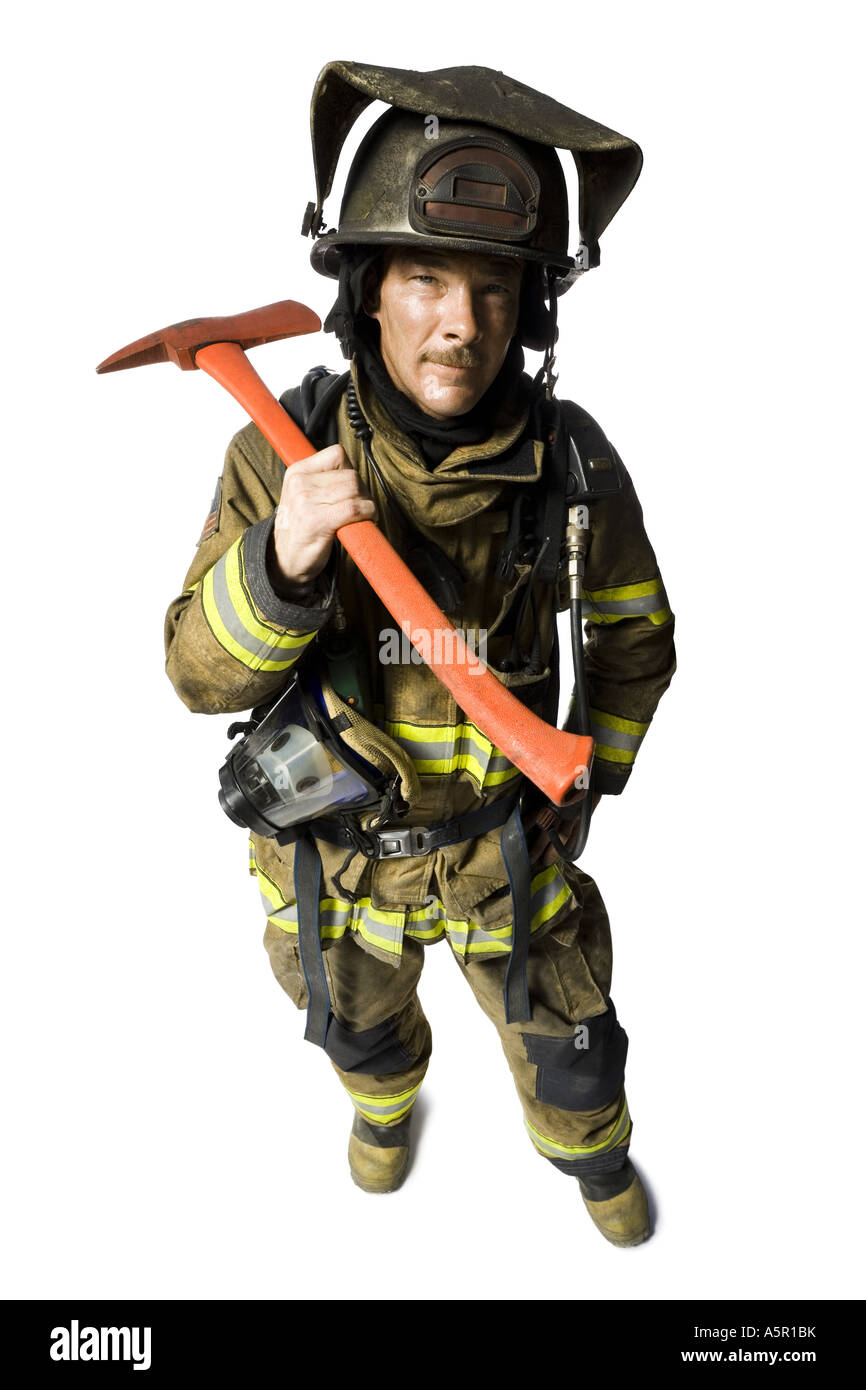 Portrait of a firefighter with axe Stock Photo - Alamy