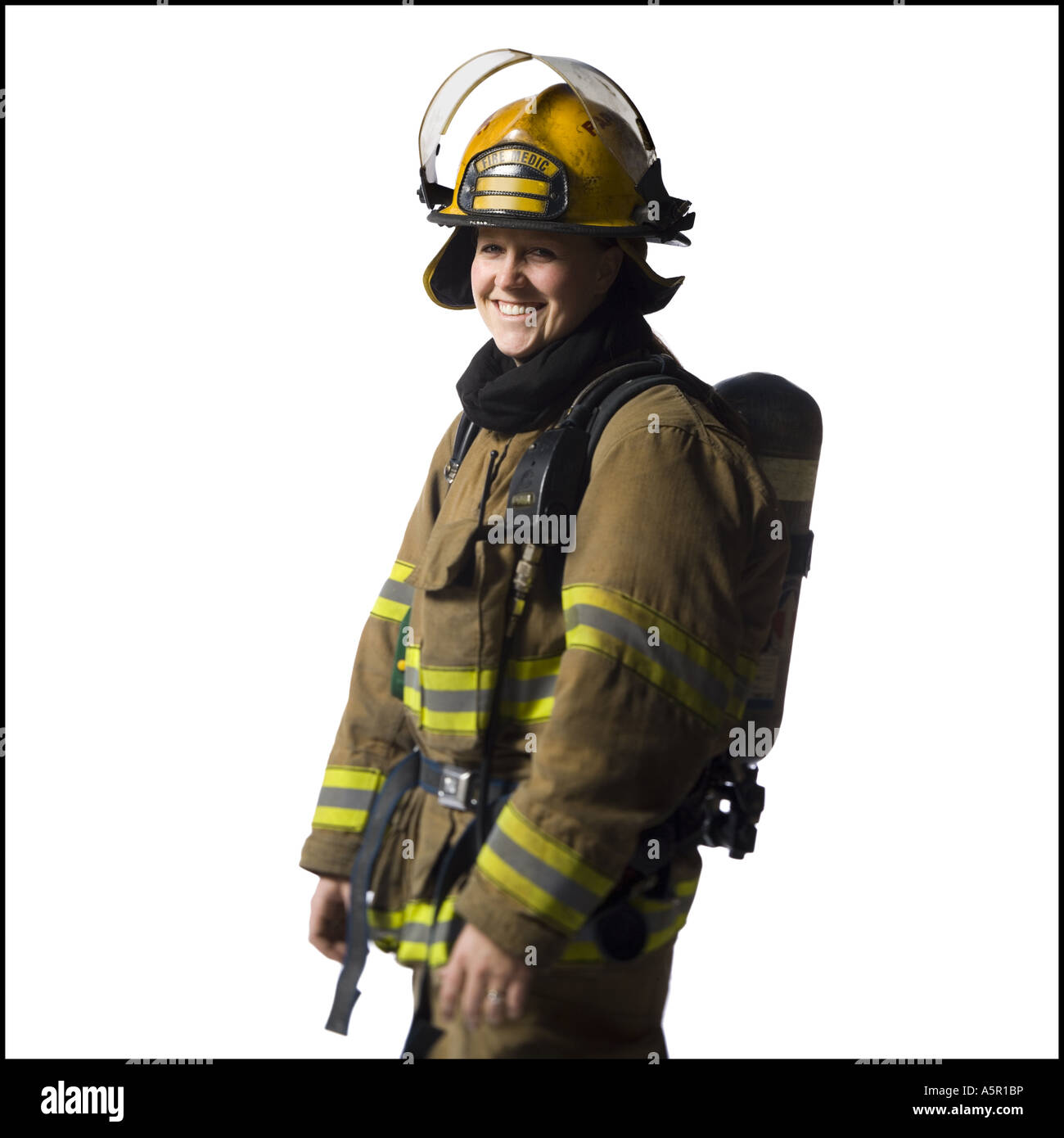 Portrait of a female firefighter smiling Stock Photo - Alamy