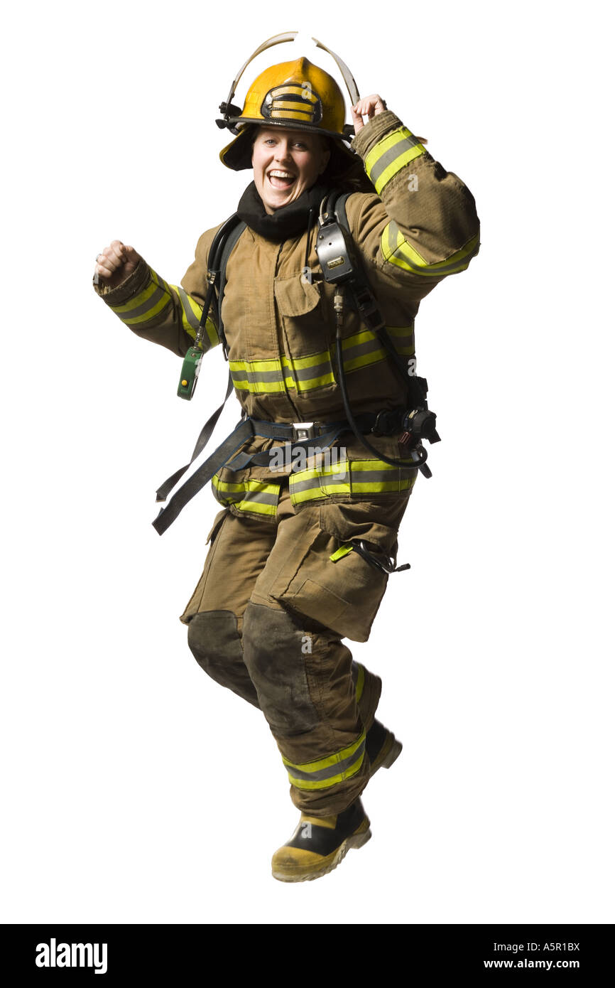 Portrait of a female firefighter dancing Stock Photo - Alamy