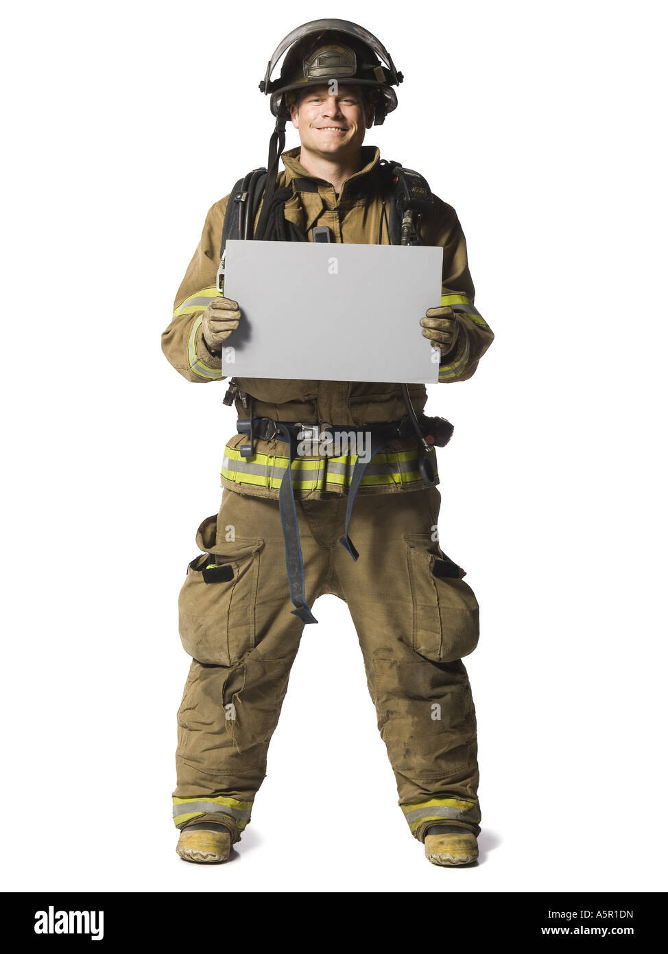 Portrait of a firefighter with blank sign Stock Photo - Alamy