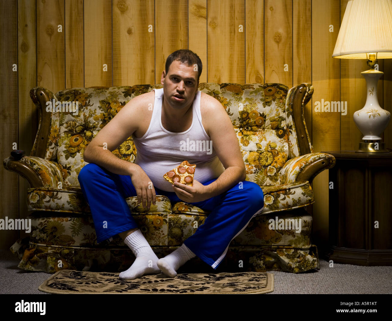 Slob man sofa hi-res stock photography and images - Alamy